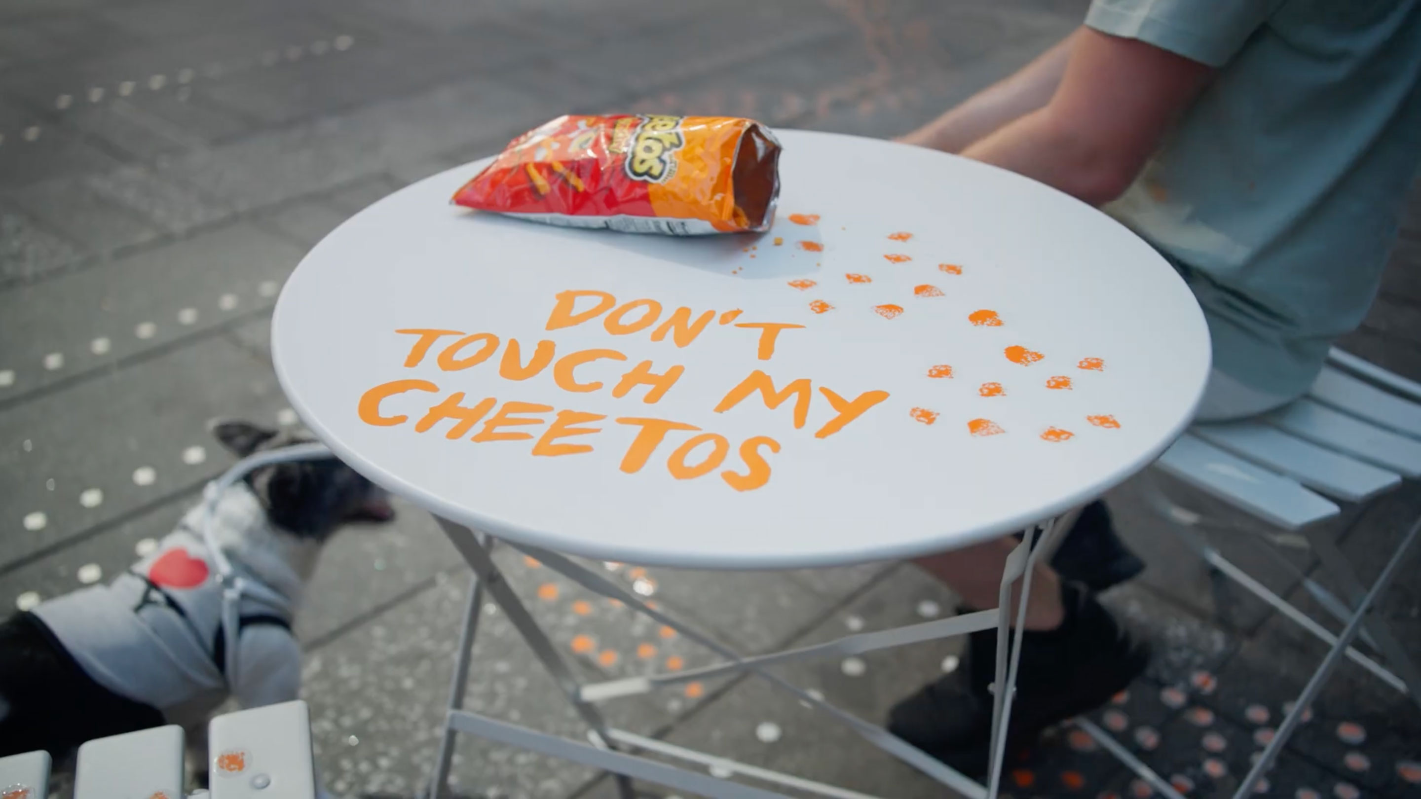 Thing from ‘Wednesday’ scurries around Times Square in Cheetos collab ...