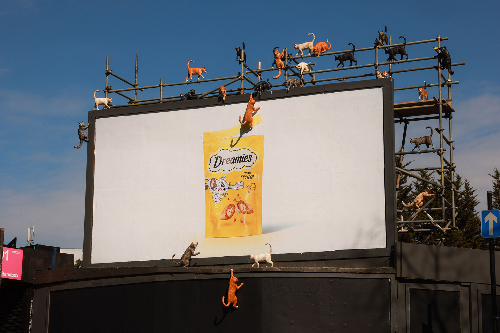 Cat-treat billboards in London are crawling with hungry felines - Ad Age
