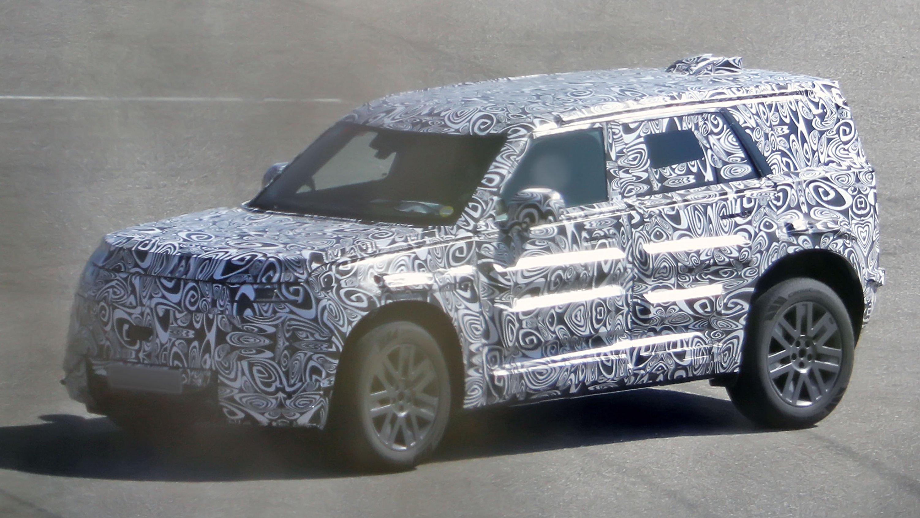 Land Rover Defender Sport takes shape, takes to the track - Automotive News