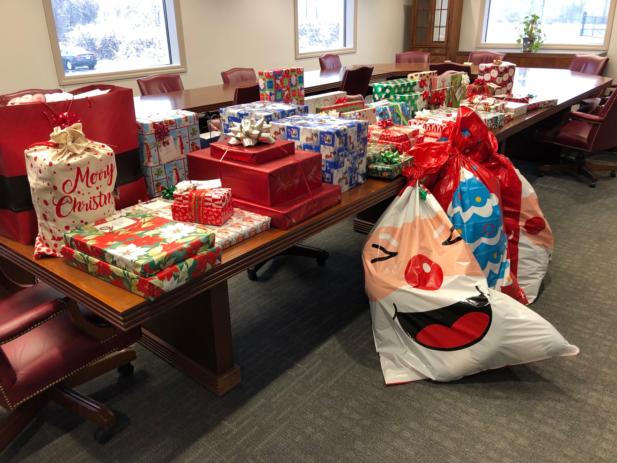 Harwick Standard buys presents for students at Akron school - Rubber News