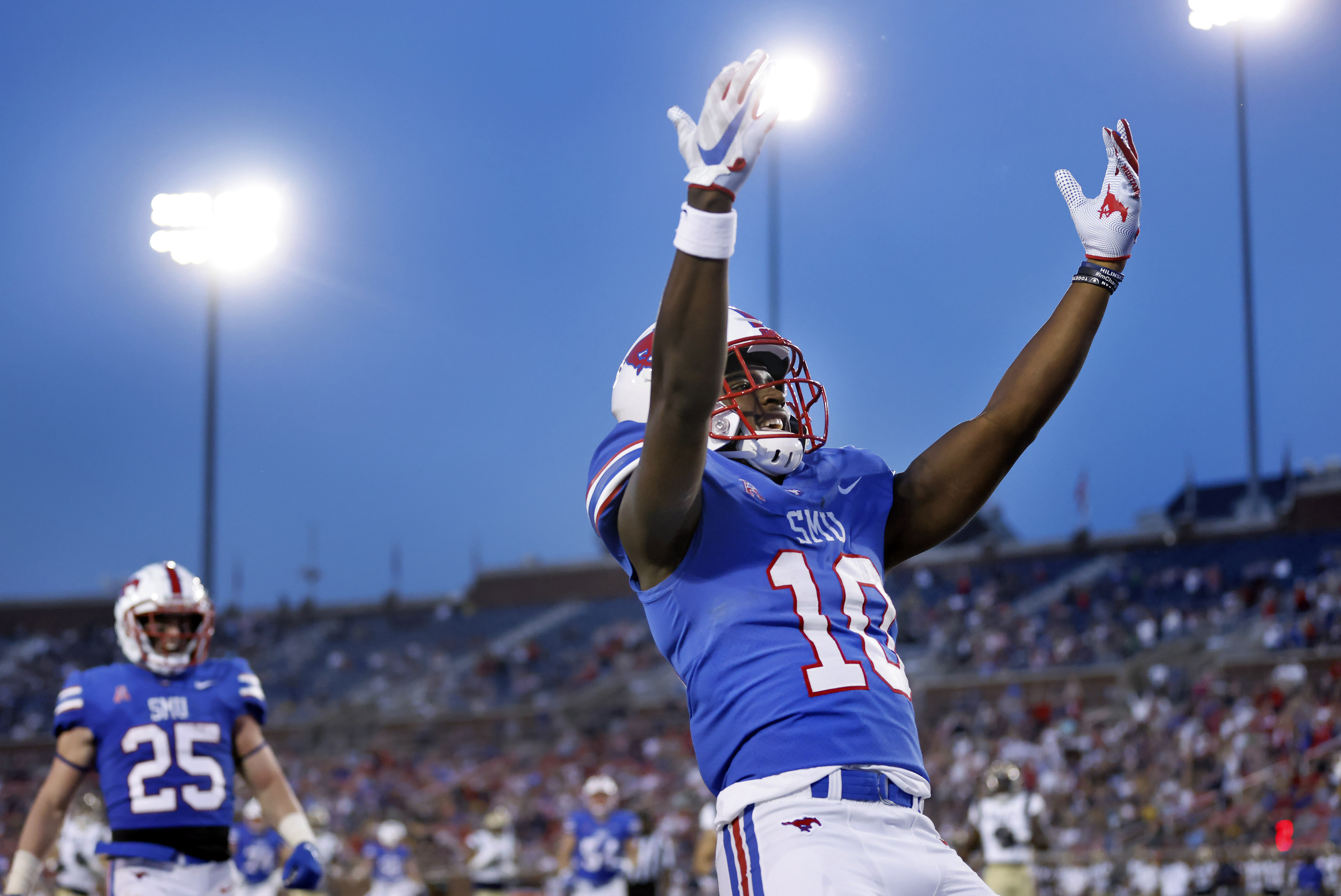 Trot forward! See photos from SMU's conference win over Navy