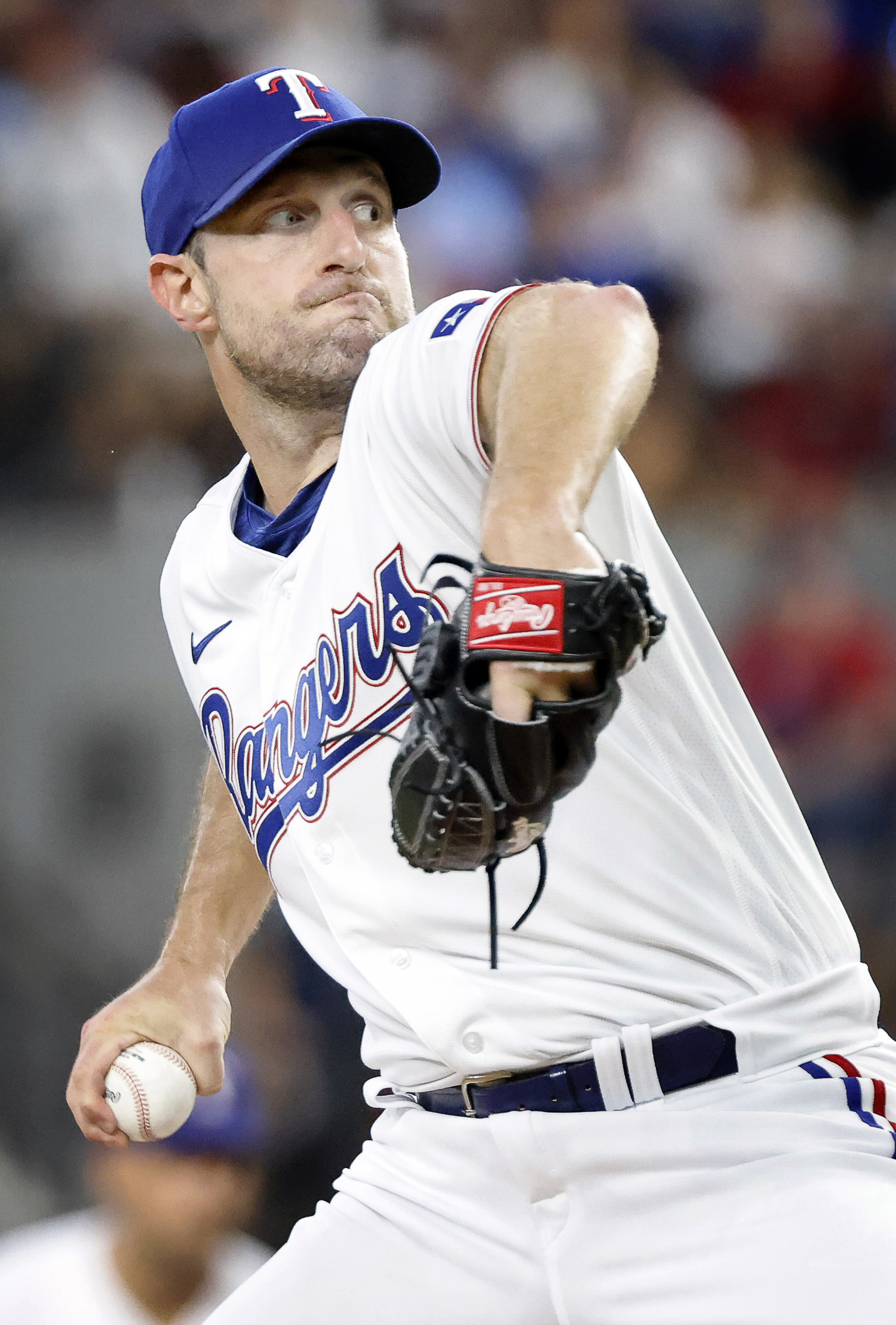 To the Max: See photos as Max Scherzer earns the win in his Rangers debut