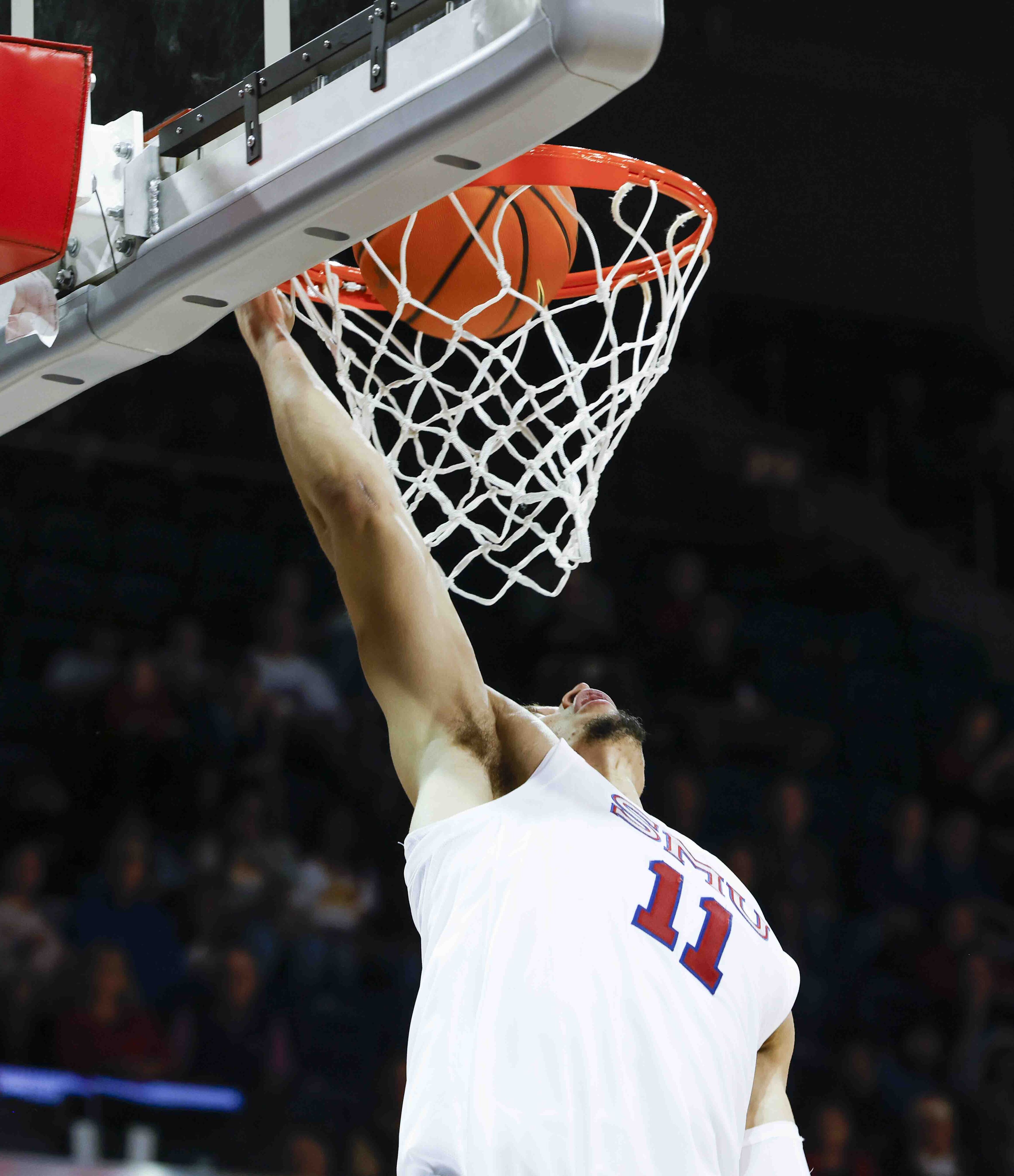 Photos: Layup line! SMU's Zhuric Phelps drives for a layup against ...