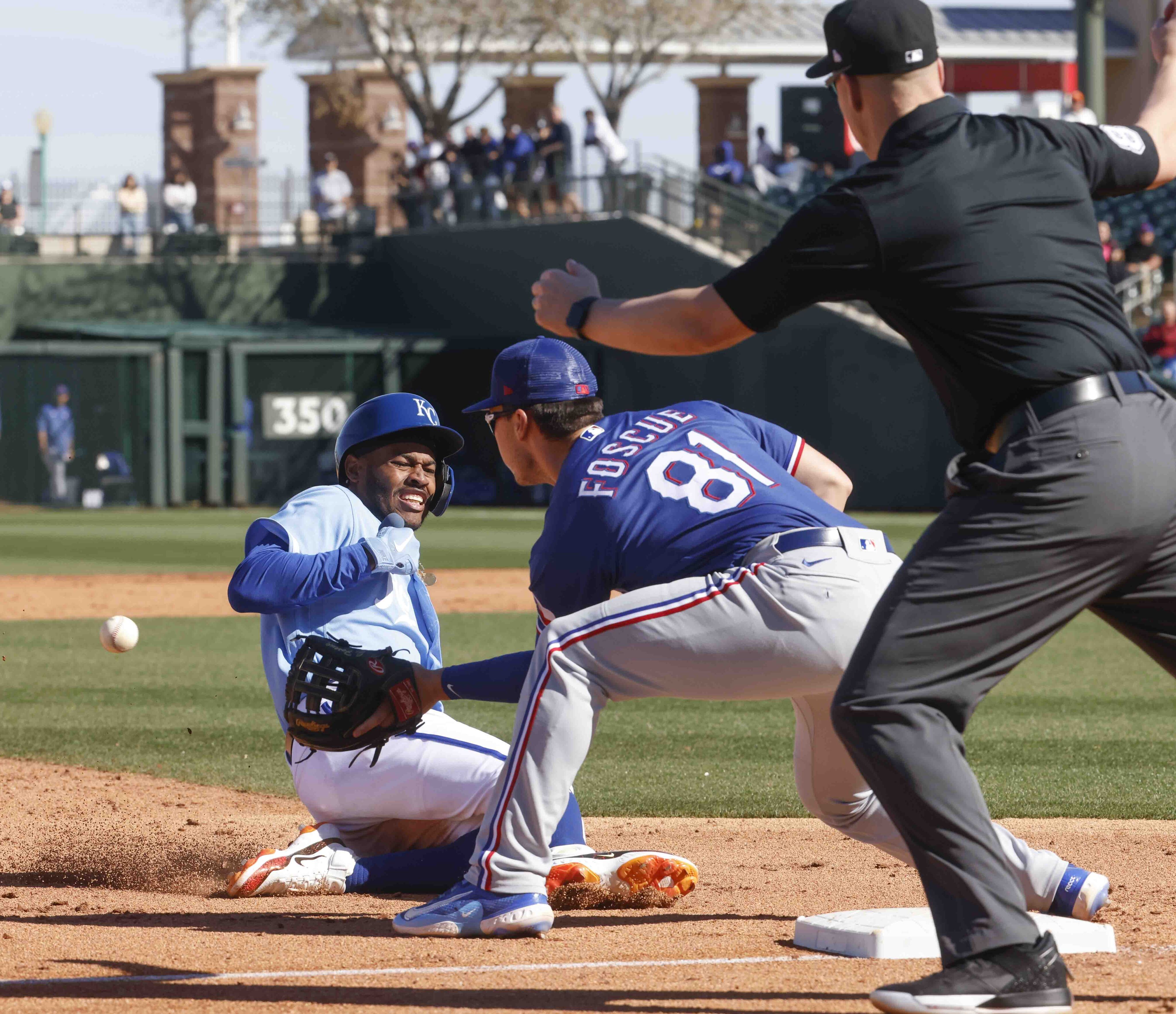 Photos: Game time! Josh Jung celebrates after scoring in the first ...