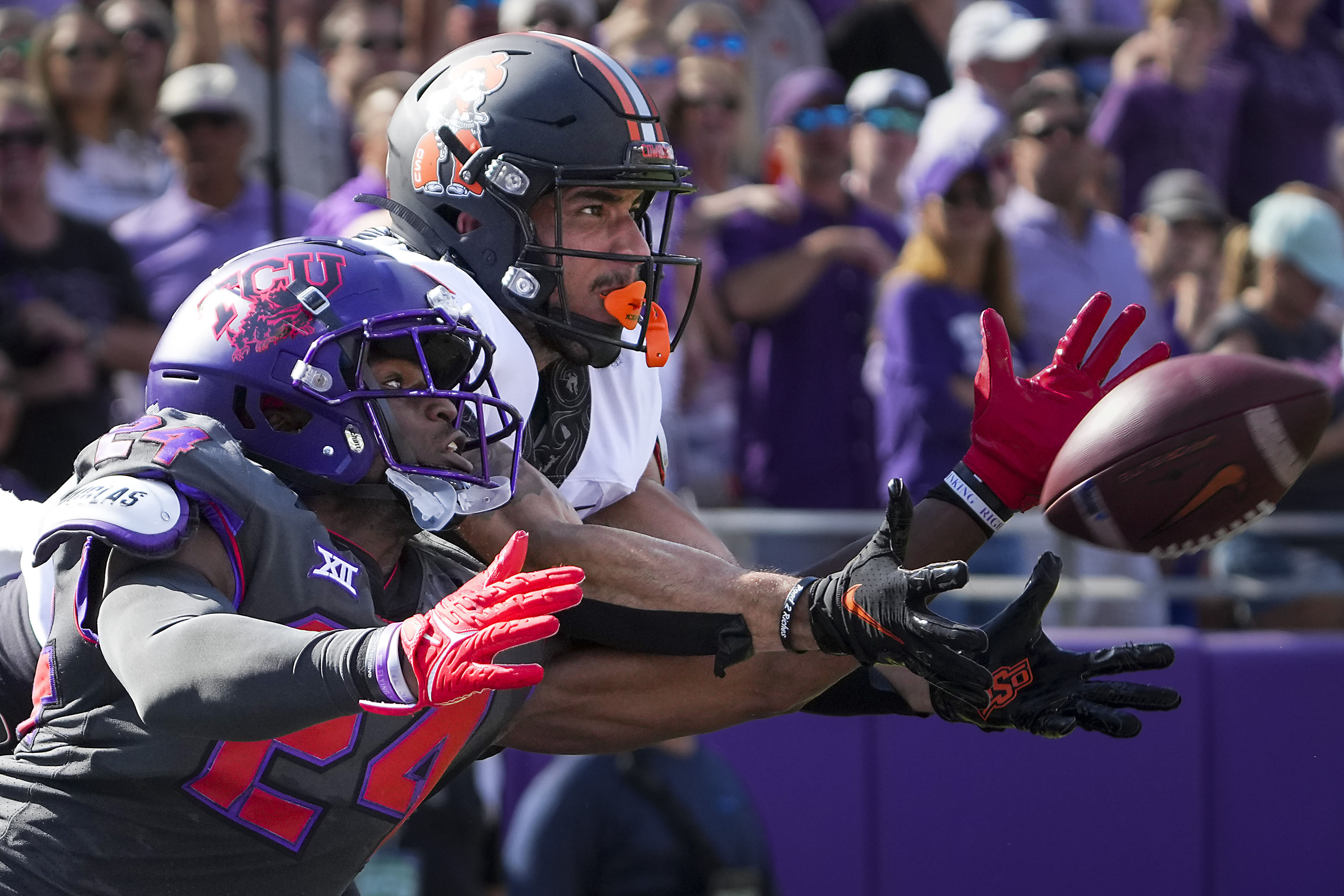 Too clutch! See photos from No. 13 TCU's double-OT win over No. 8 ...