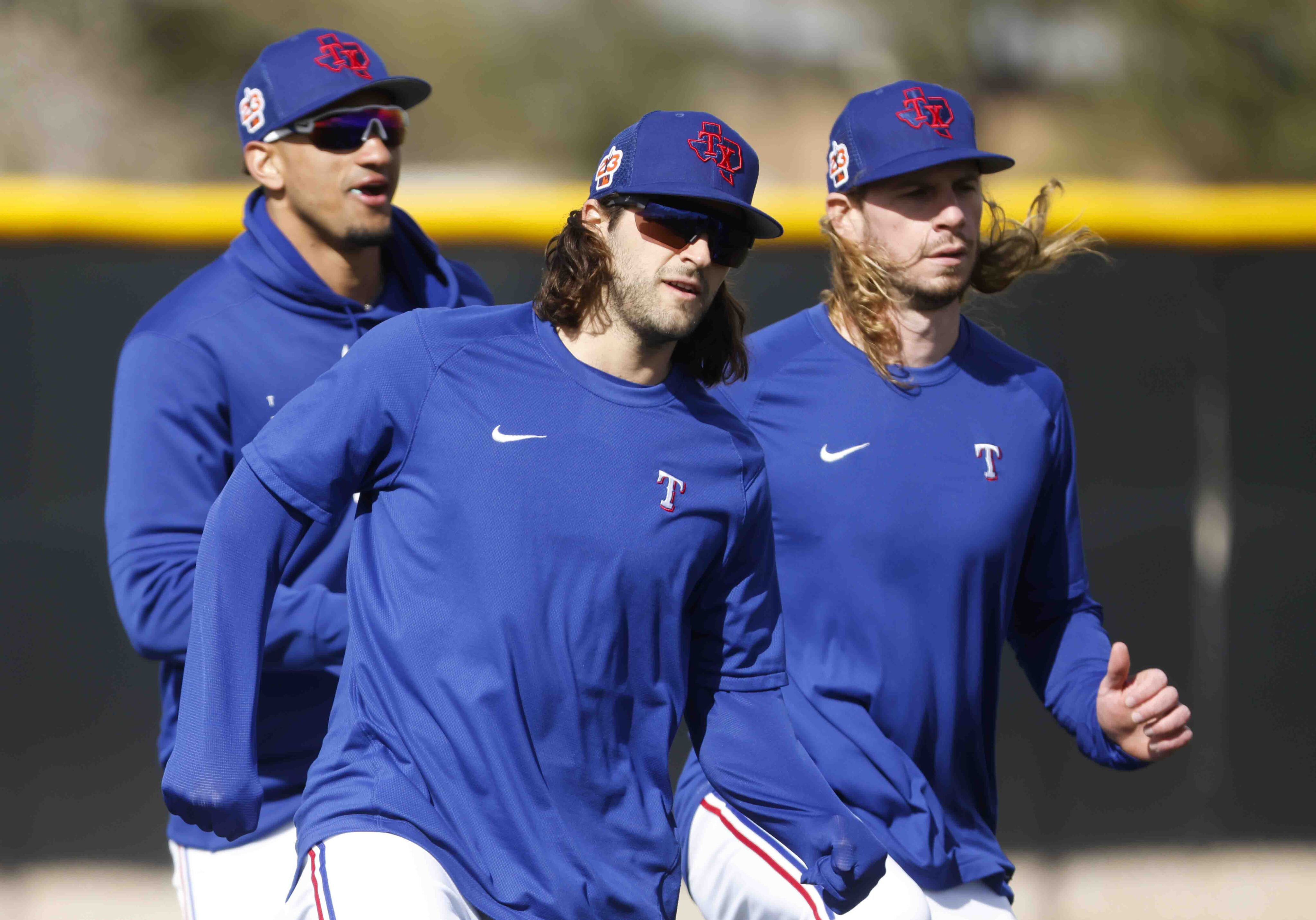 Photos: I got it! Ezequiel Duran catches a ball at Rangers' spring training
