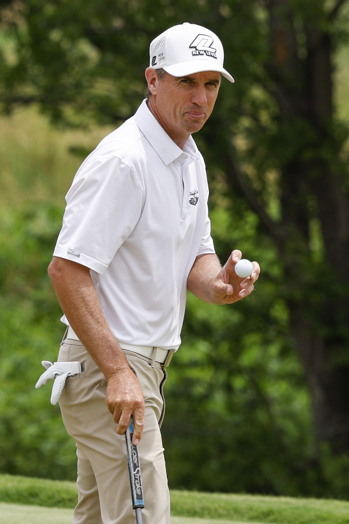Photos: Alex Cejka hits out of the bunker on the 18th hole at Senior ...