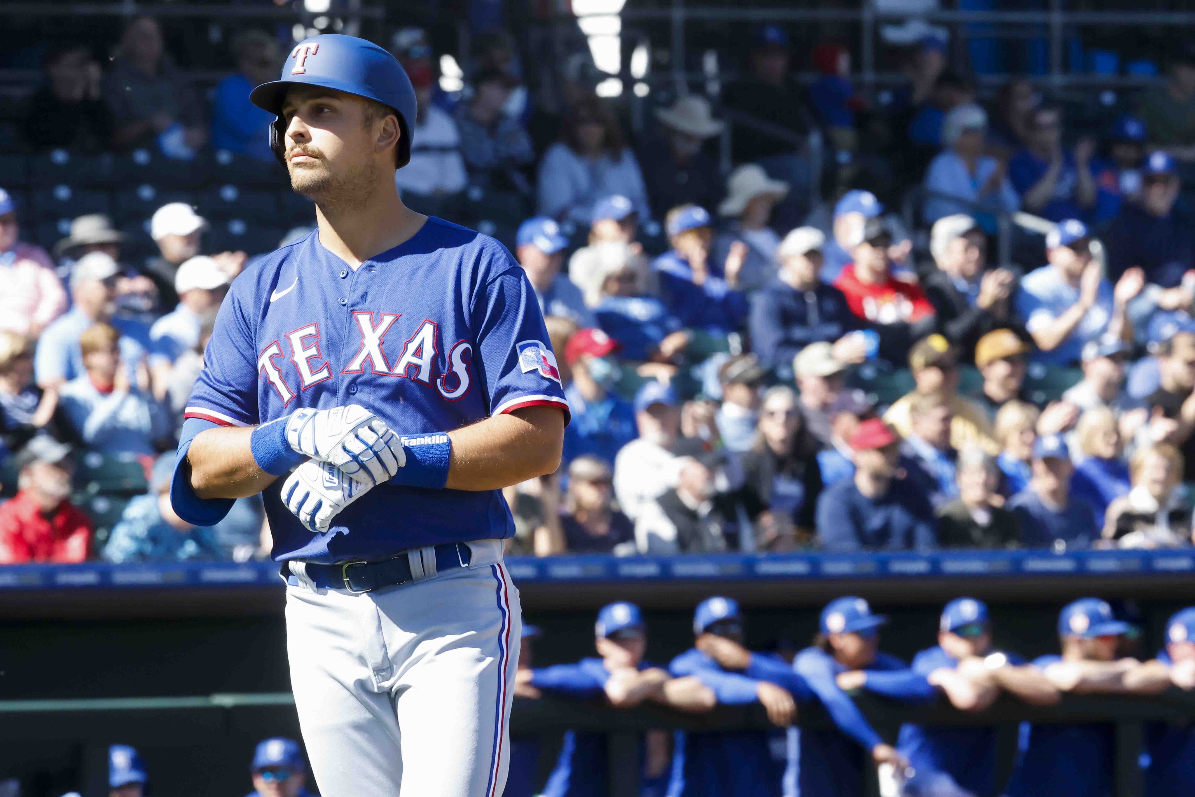 Photos: Game time! Josh Jung celebrates after scoring in the first ...