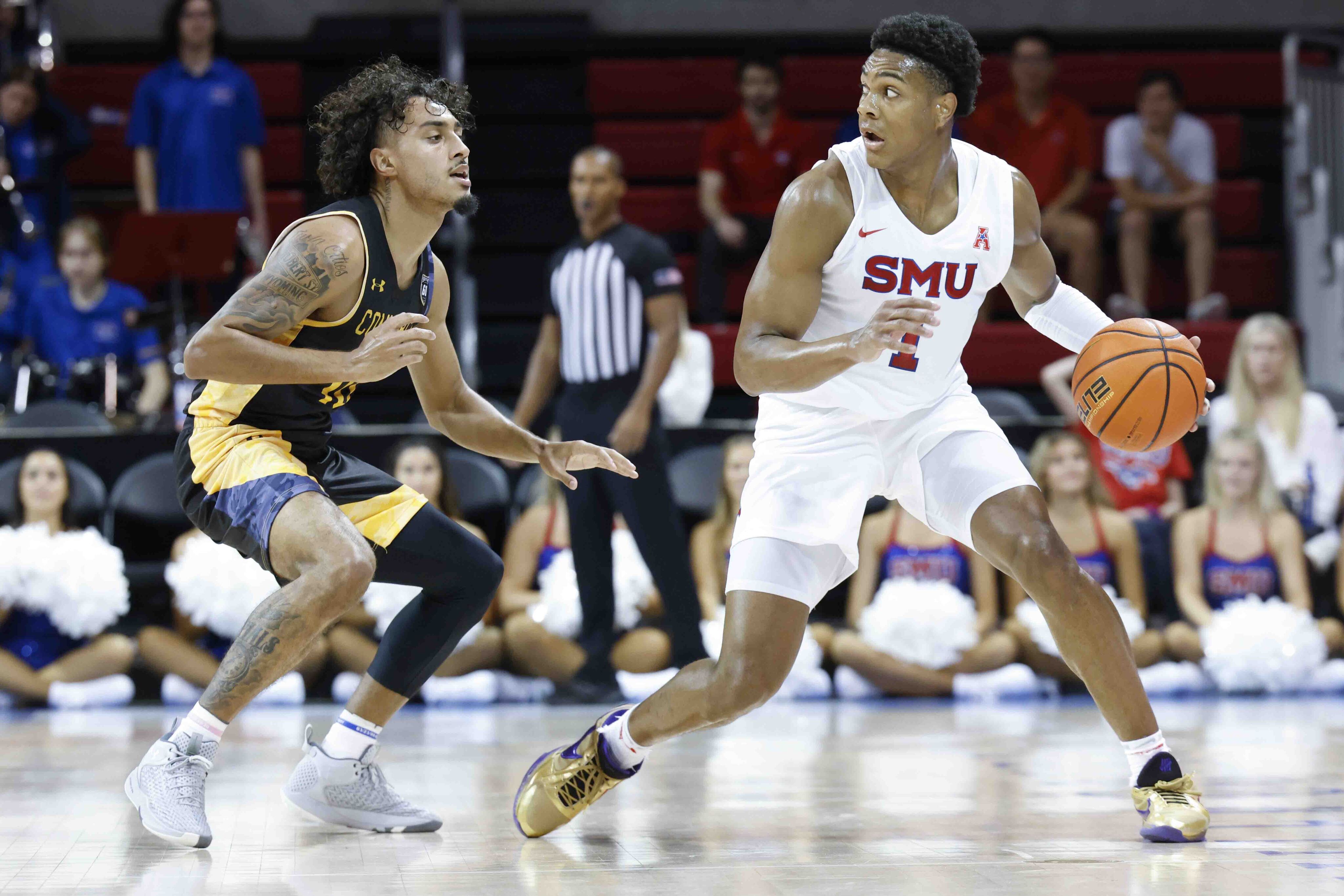 Photos: Layup line! SMU's Zhuric Phelps drives for a layup against ...