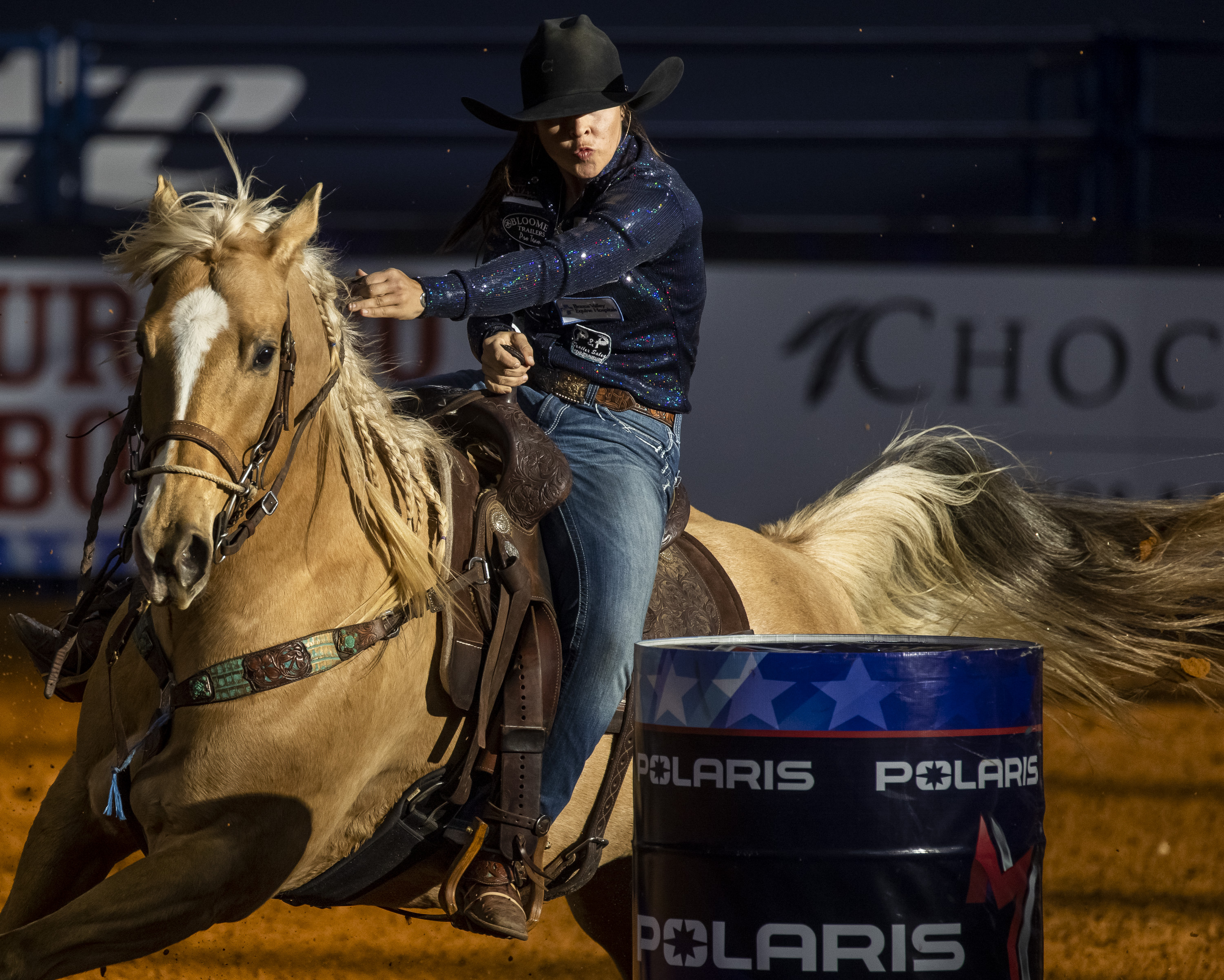 Photos: Hold on tight! Whitlee Burgess competes in the breakaway ...