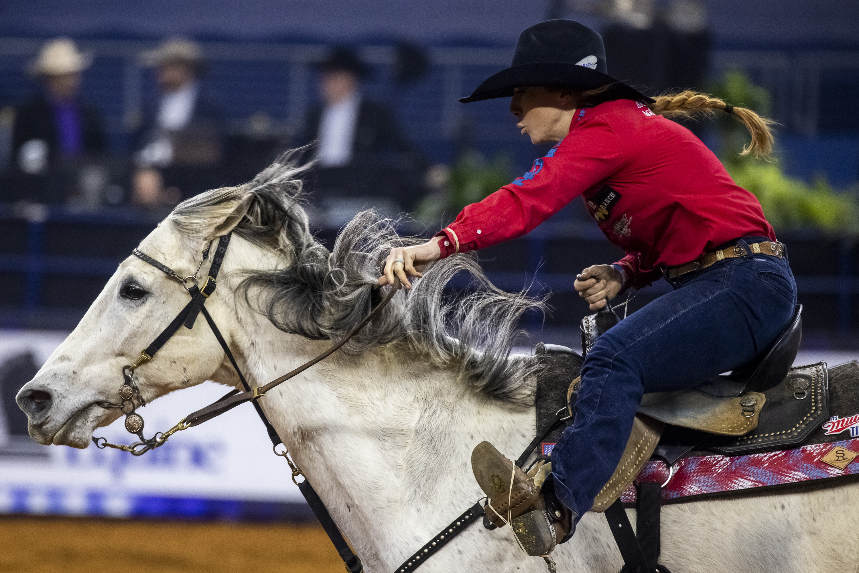 Photos: Hold on tight! Whitlee Burgess competes in the breakaway ...