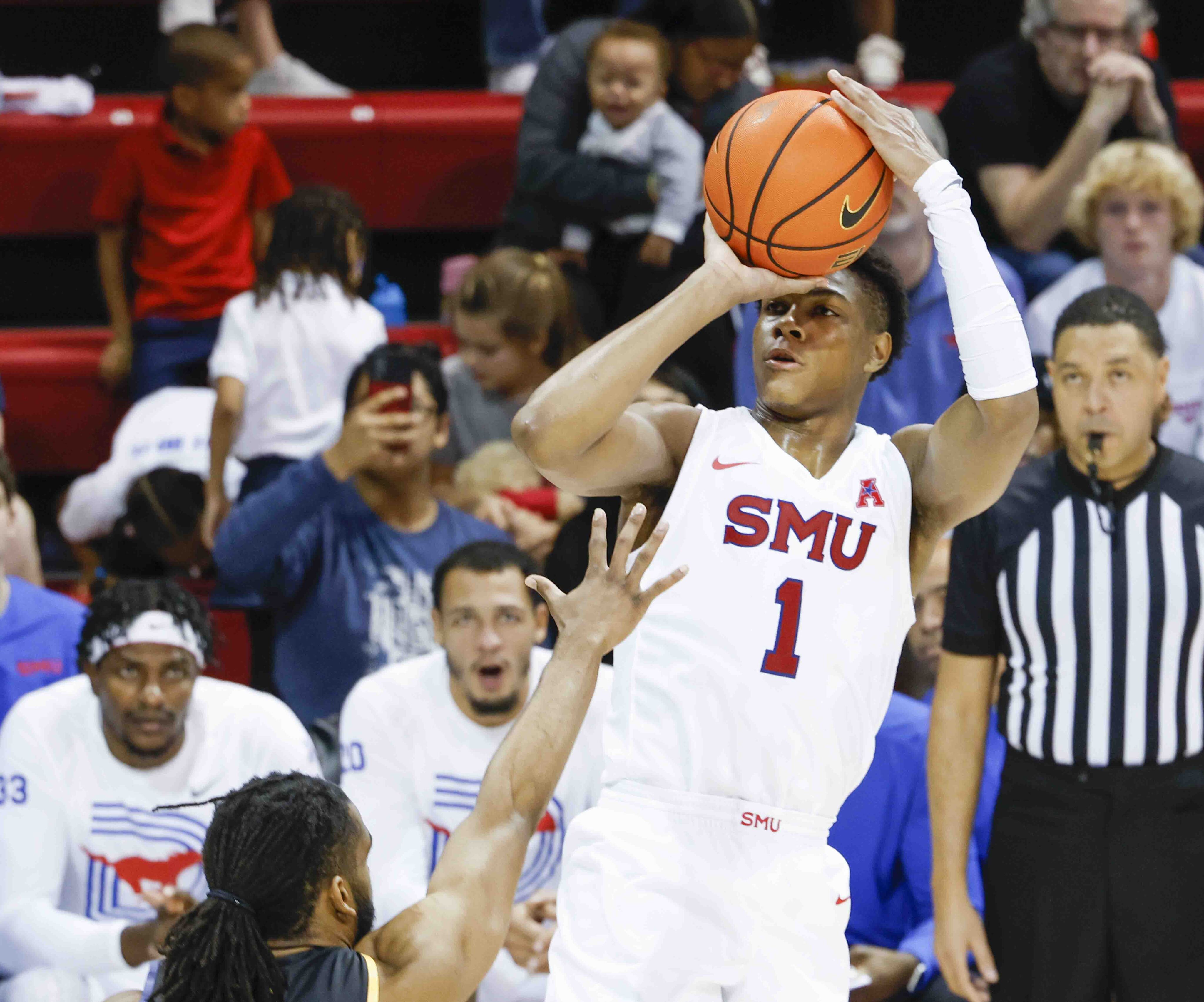 Photos: Layup line! SMU's Zhuric Phelps drives for a layup against ...