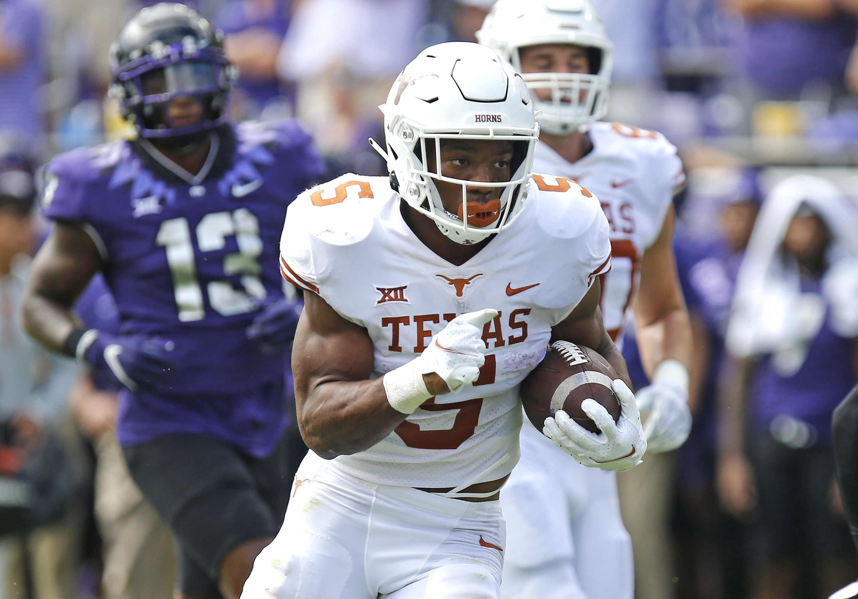 Photos: Bijan Robinson runs all over TCU, Texas celebrates win over ...