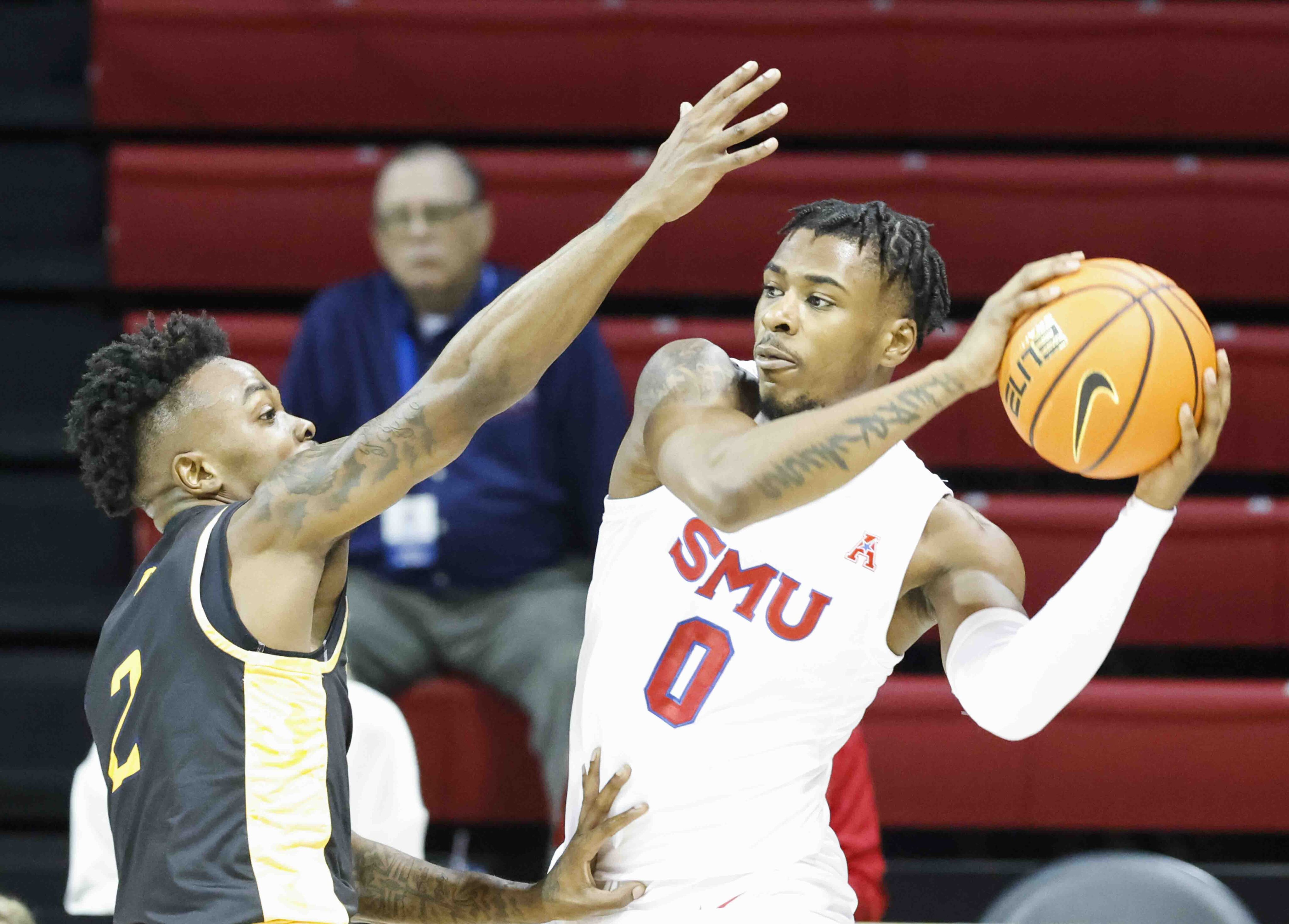 Photos: Layup line! SMU's Zhuric Phelps drives for a layup against ...