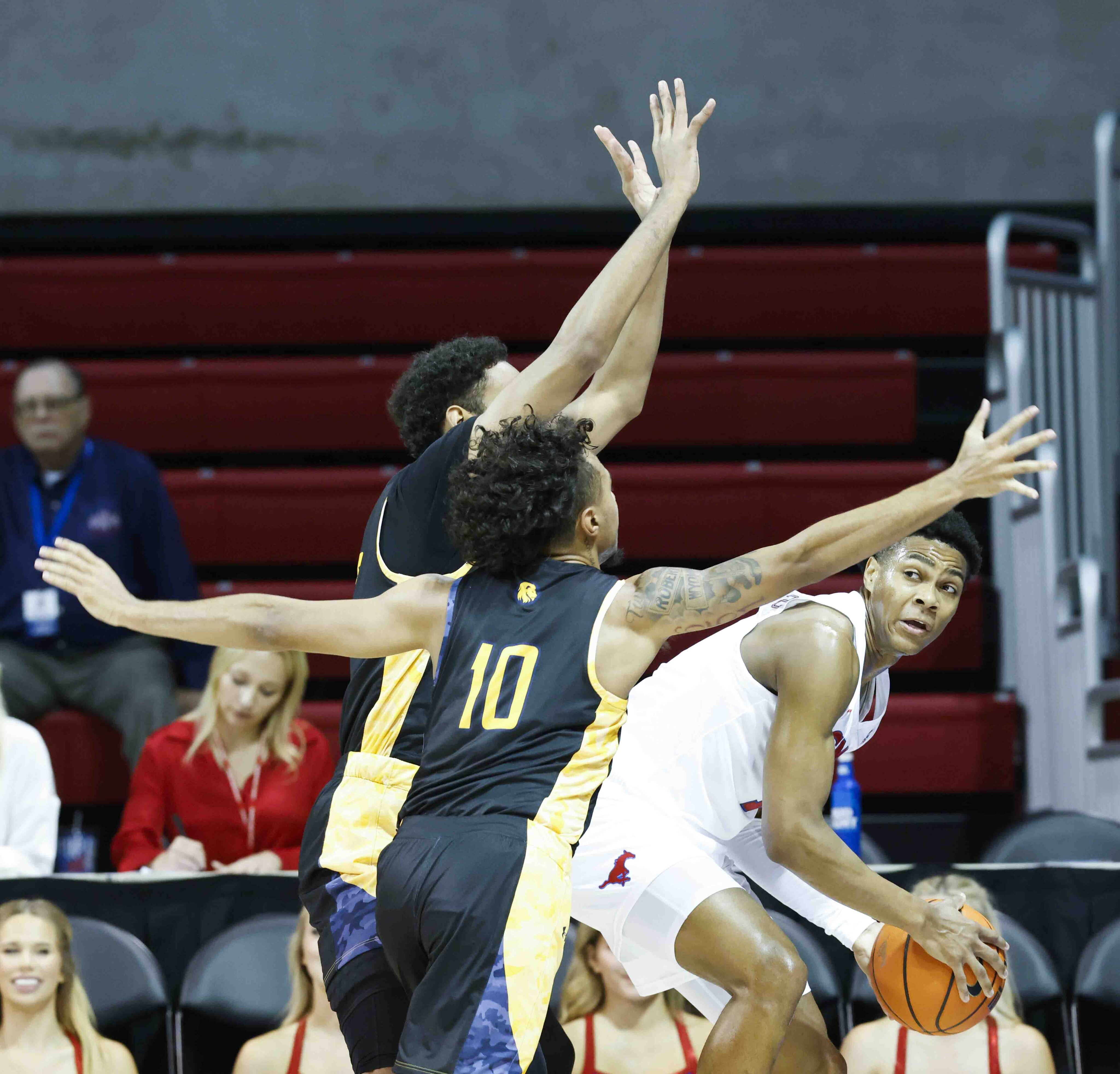Photos: Layup line! SMU's Zhuric Phelps drives for a layup against ...