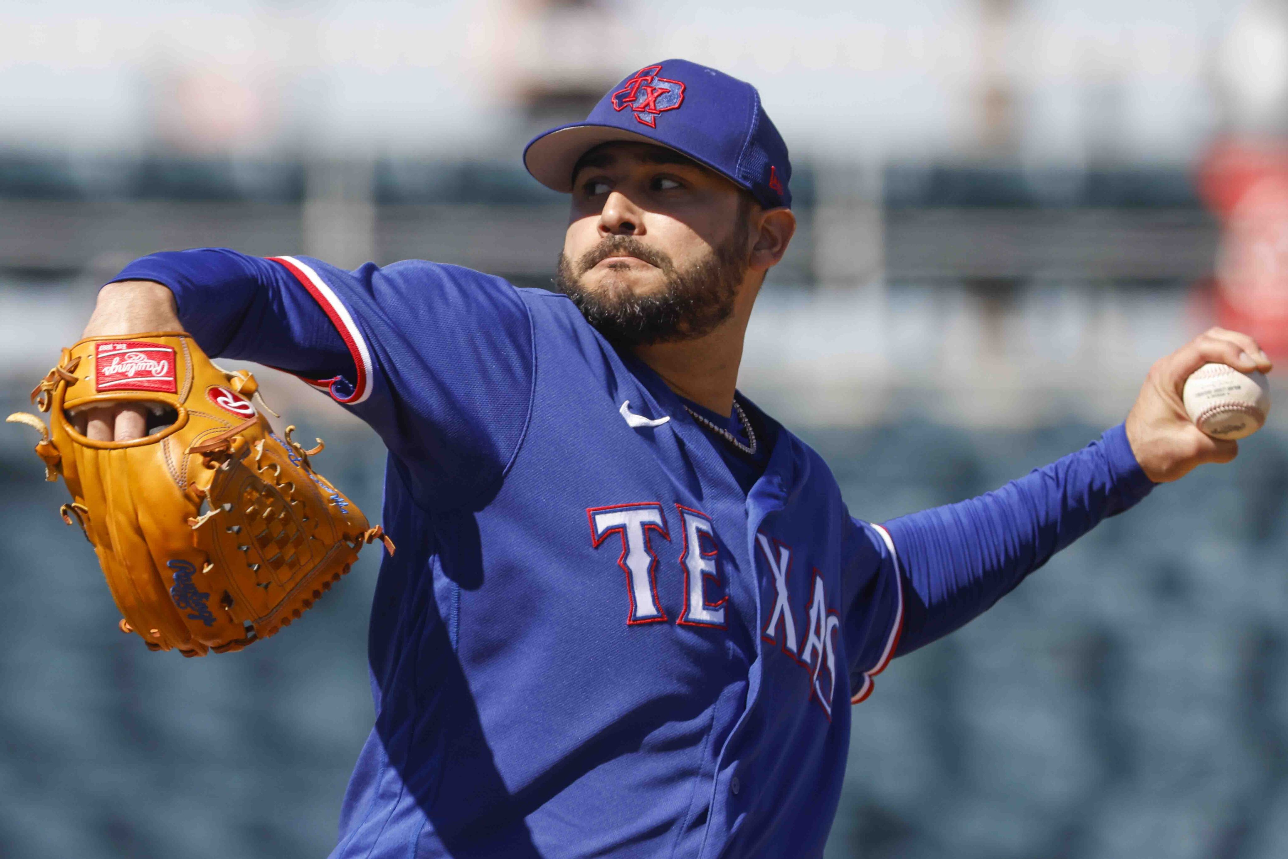 Photos: Up top! Rangers Jonathan Ornelas, Joe McCarthy high-five after ...