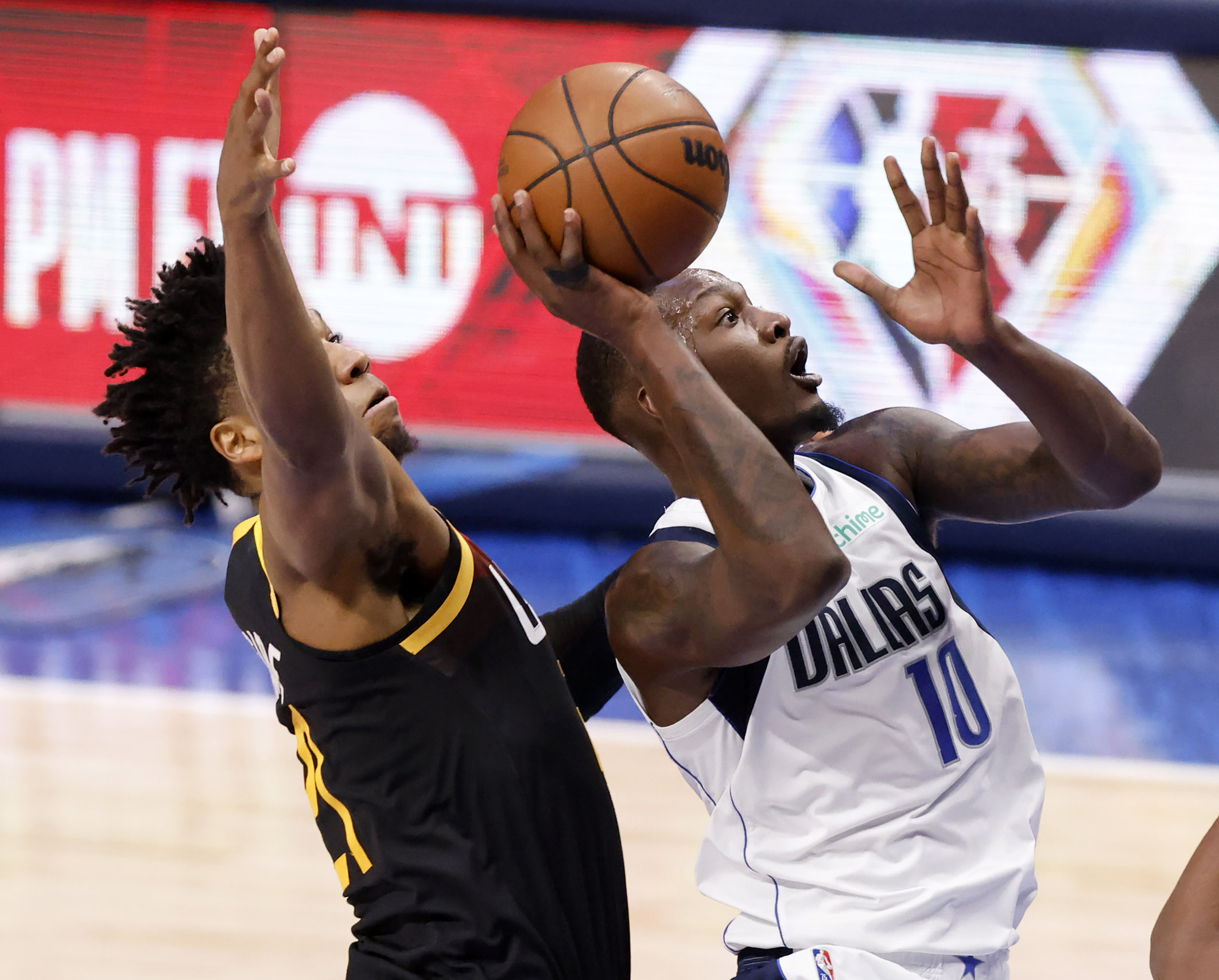 Photos: Hold the pose! Mavs forward Dorian Finney-Smith hits a 3 ...