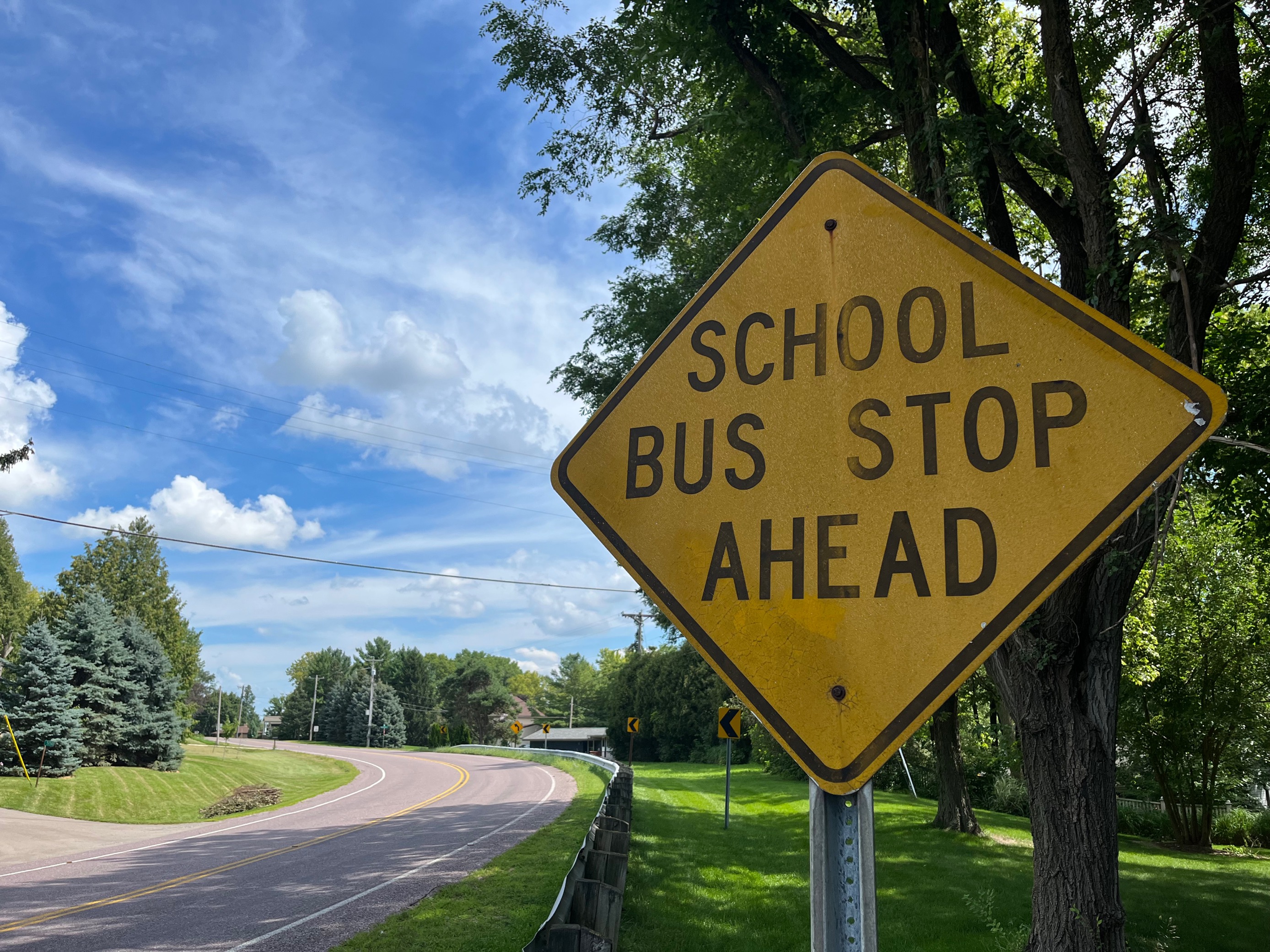 School Bus Stop Ahead Sign