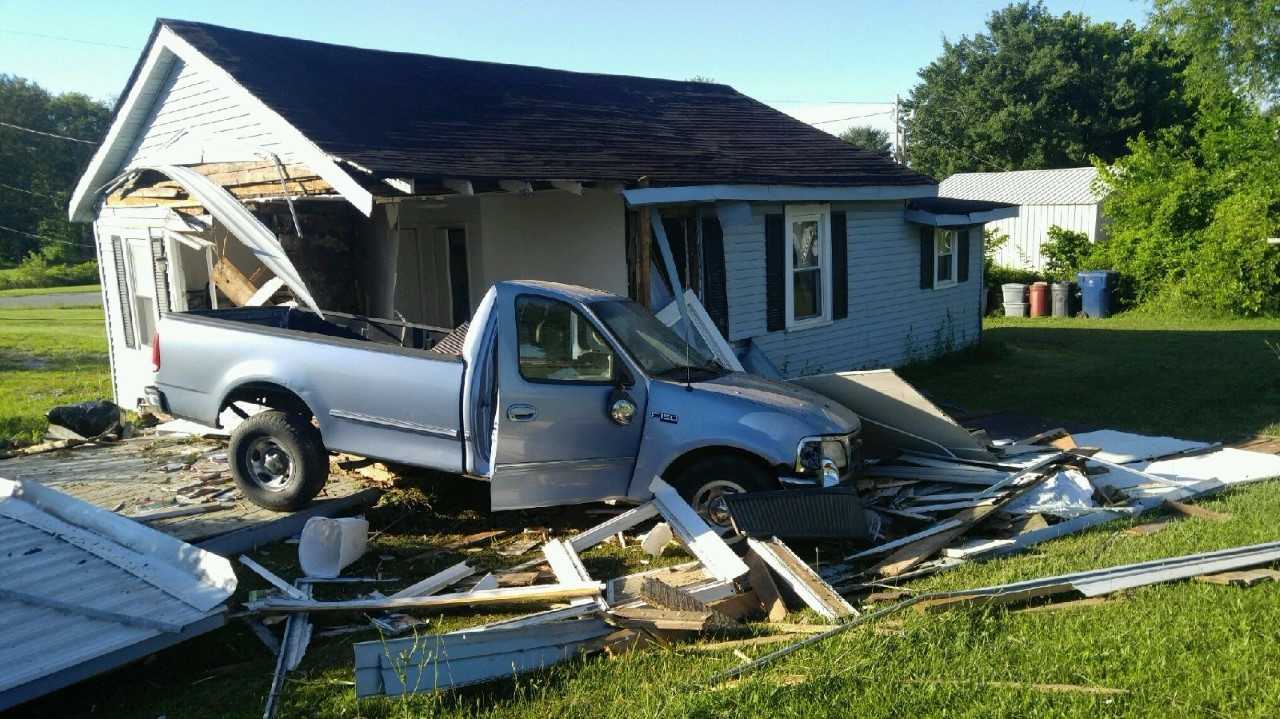 Truck Crashing Into House