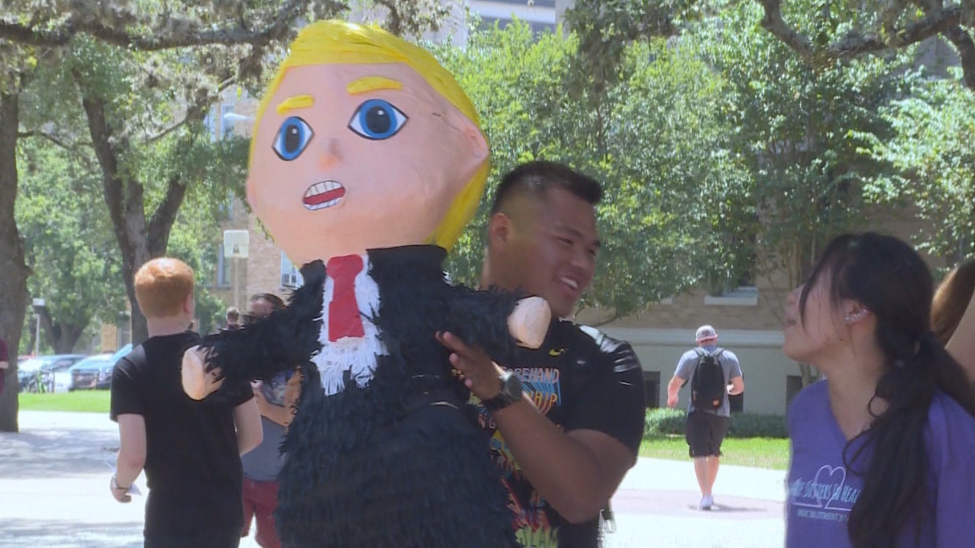 Students protest Trump, stuff pinata in his likeness