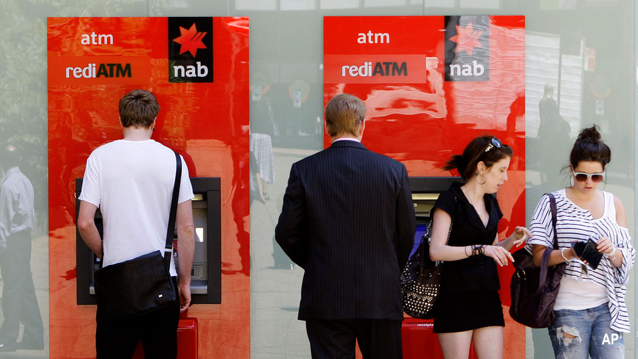 NAB cuts dividend after $2.95b H1 profit