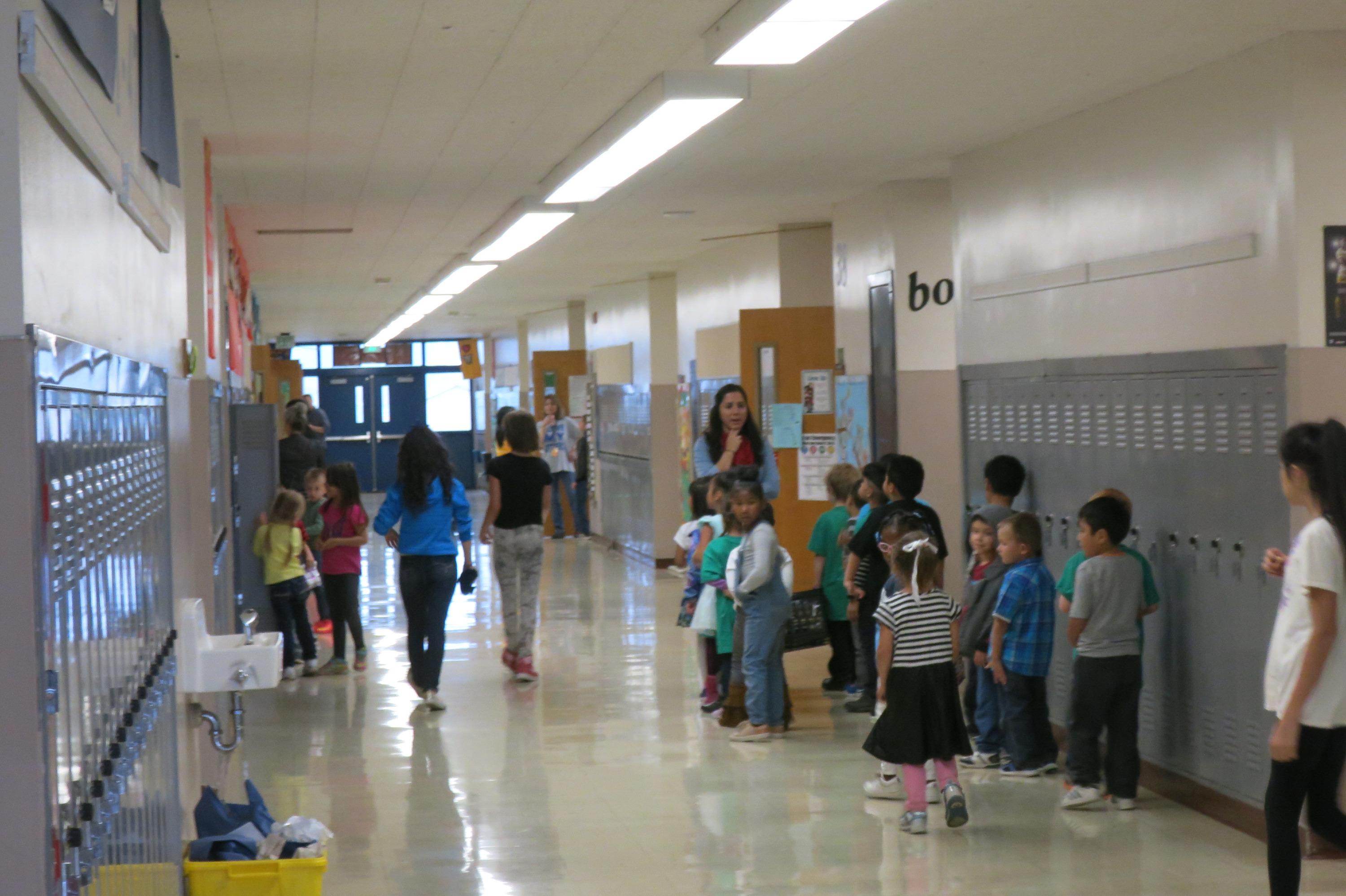 Elementary School Hallway With Students