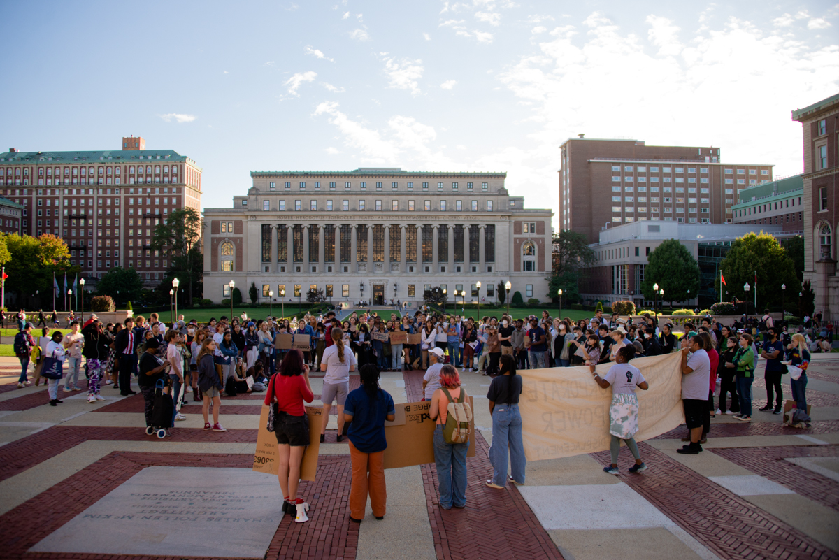 Students and Harlem residents protest gentrification on Low Steps