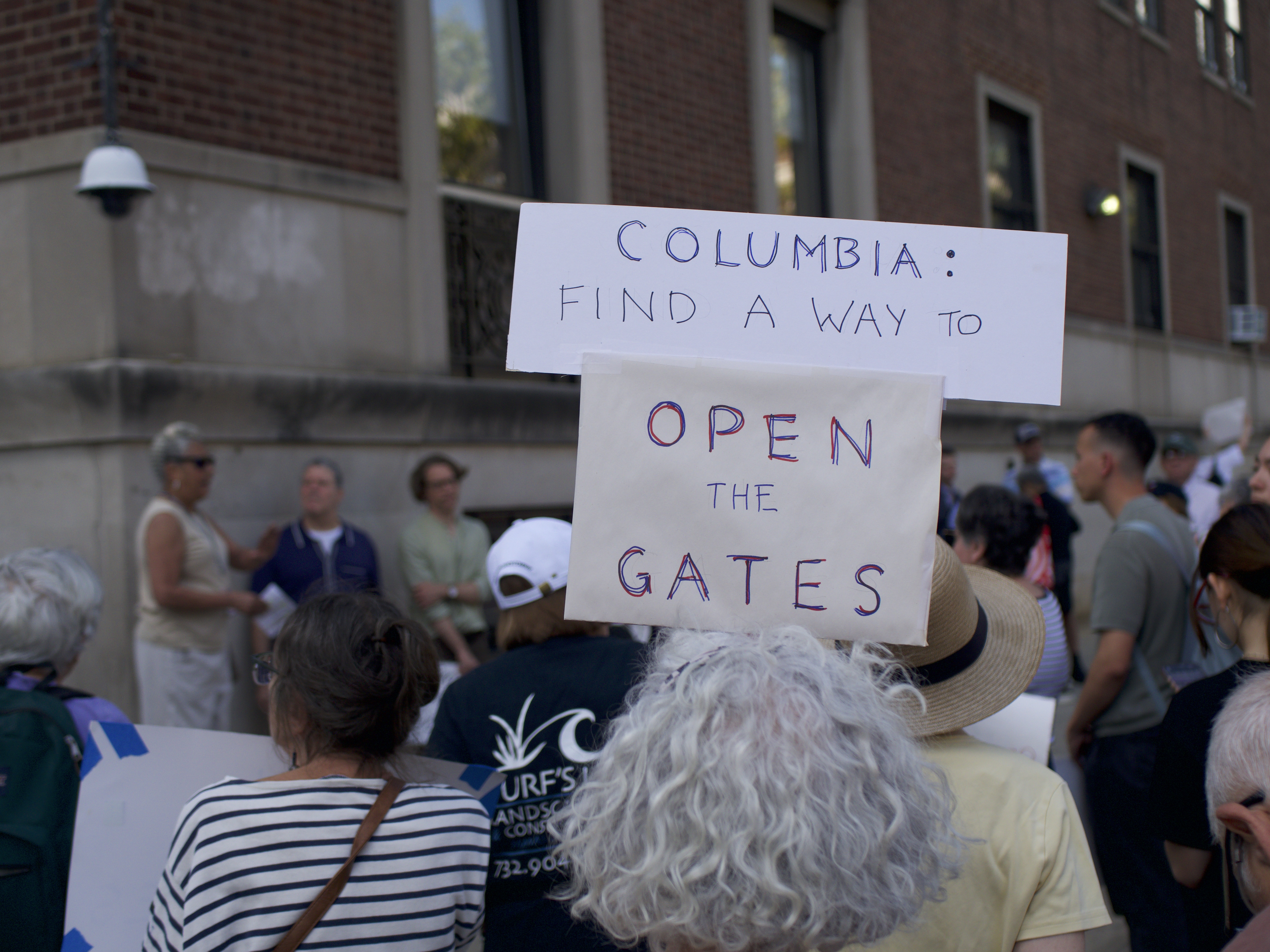 ‘It’s time to open the gates’: Community members rally in support of ...