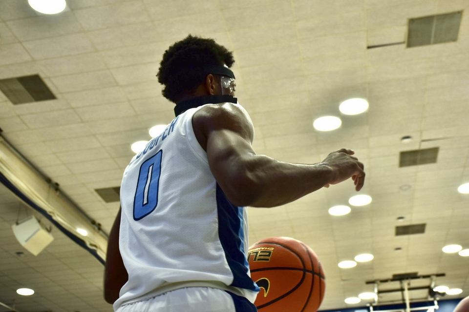 Men’s basketball holds off reigning Ivy League champion Yale