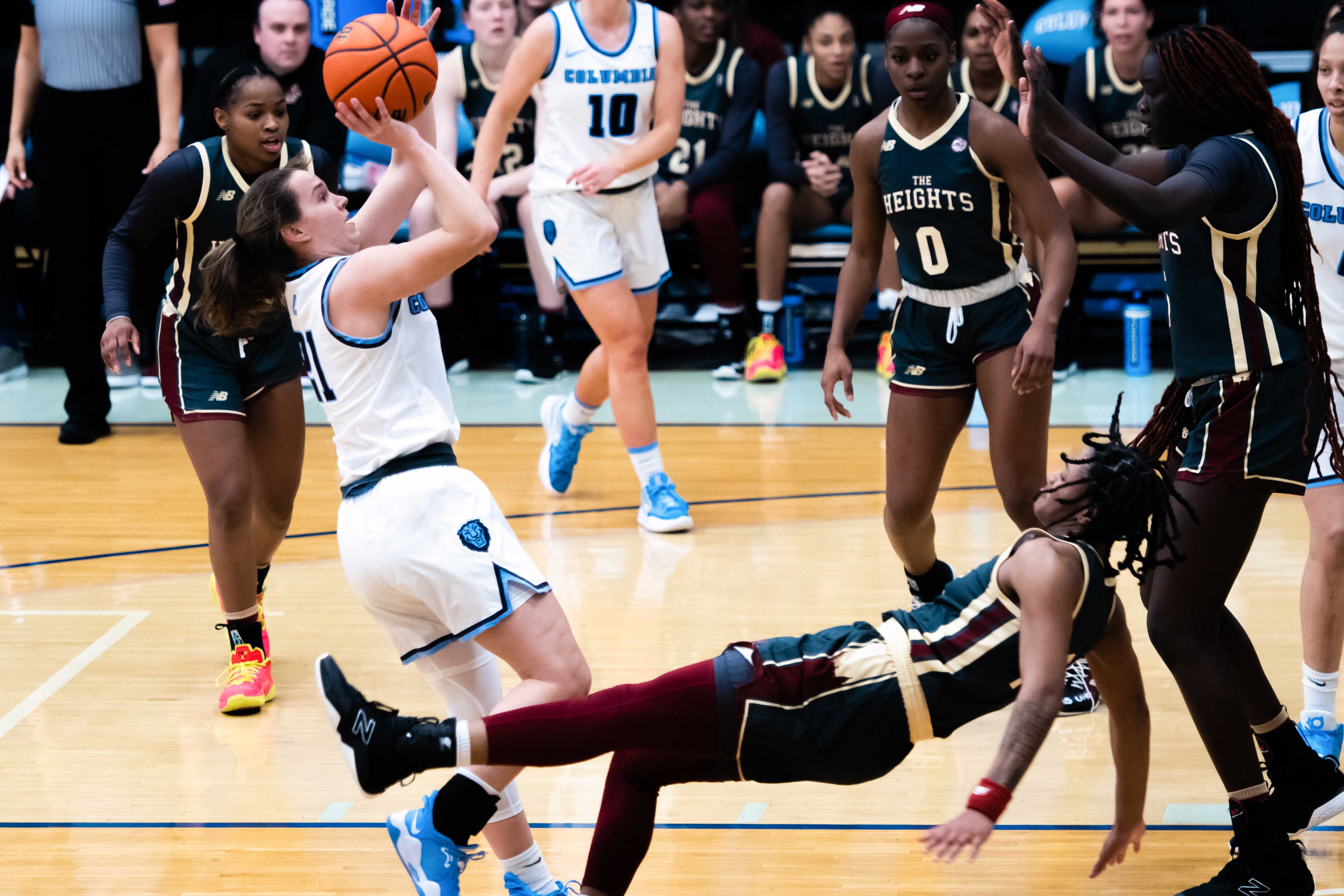 In Focus: Columbia fans storm the court after women’s basketball’s ...