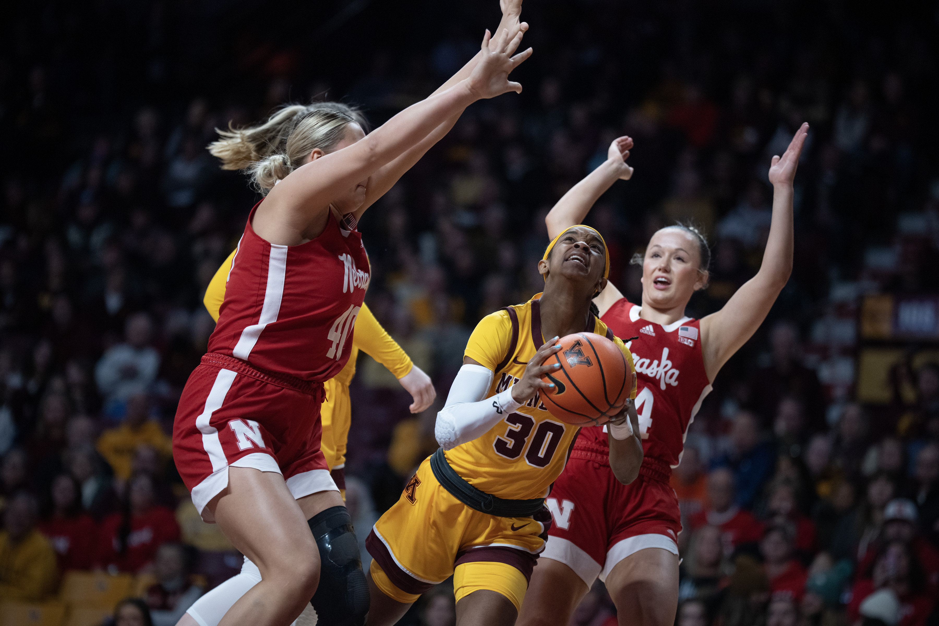 Gophers beat Nebraska 62-58 as other scoring options deliver