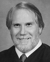 After months away, Anoka County judge back on bench