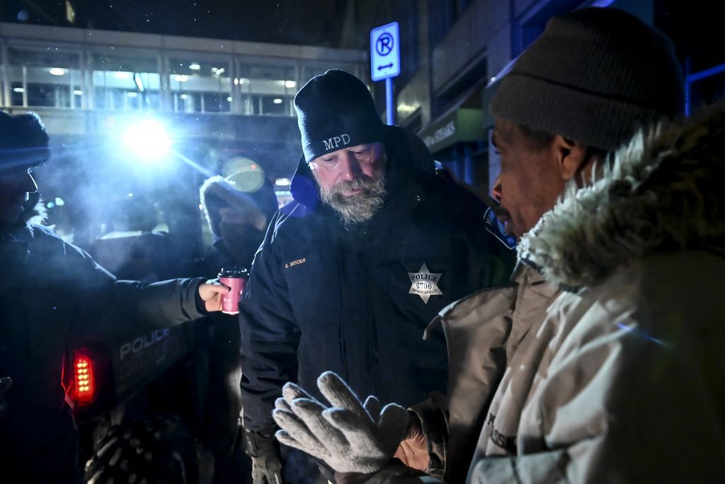 Minneapolis police join efforts to hand out cold weather gear to homeless