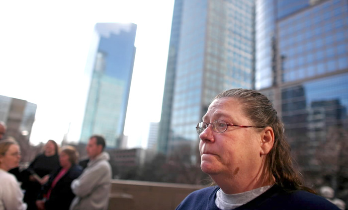 Defiant convicted murderer curses victims' families