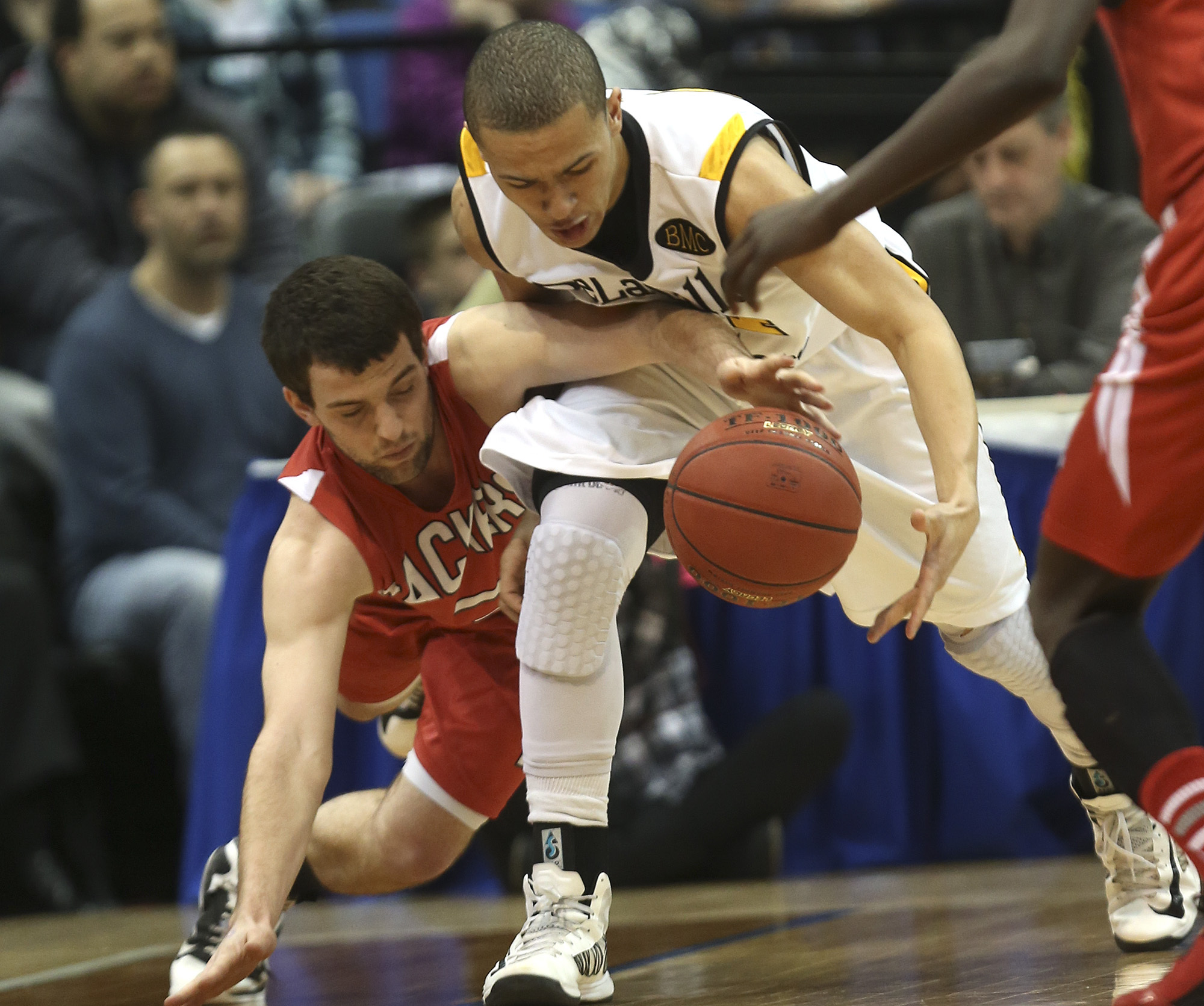 Class 3A: DeLaSalle routs Austin with Reid and patience