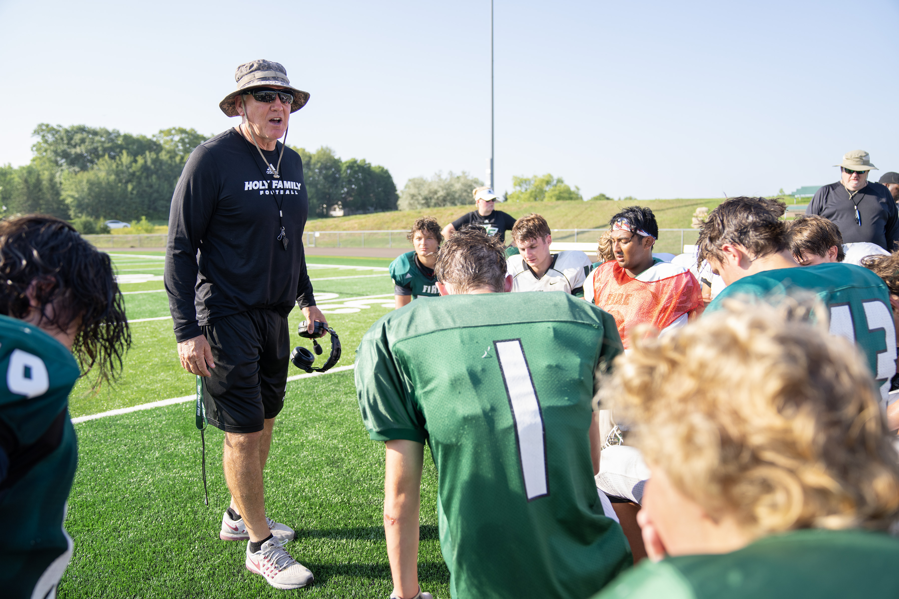 Hall of Fame football coaches take on Holy Family Catholic High program