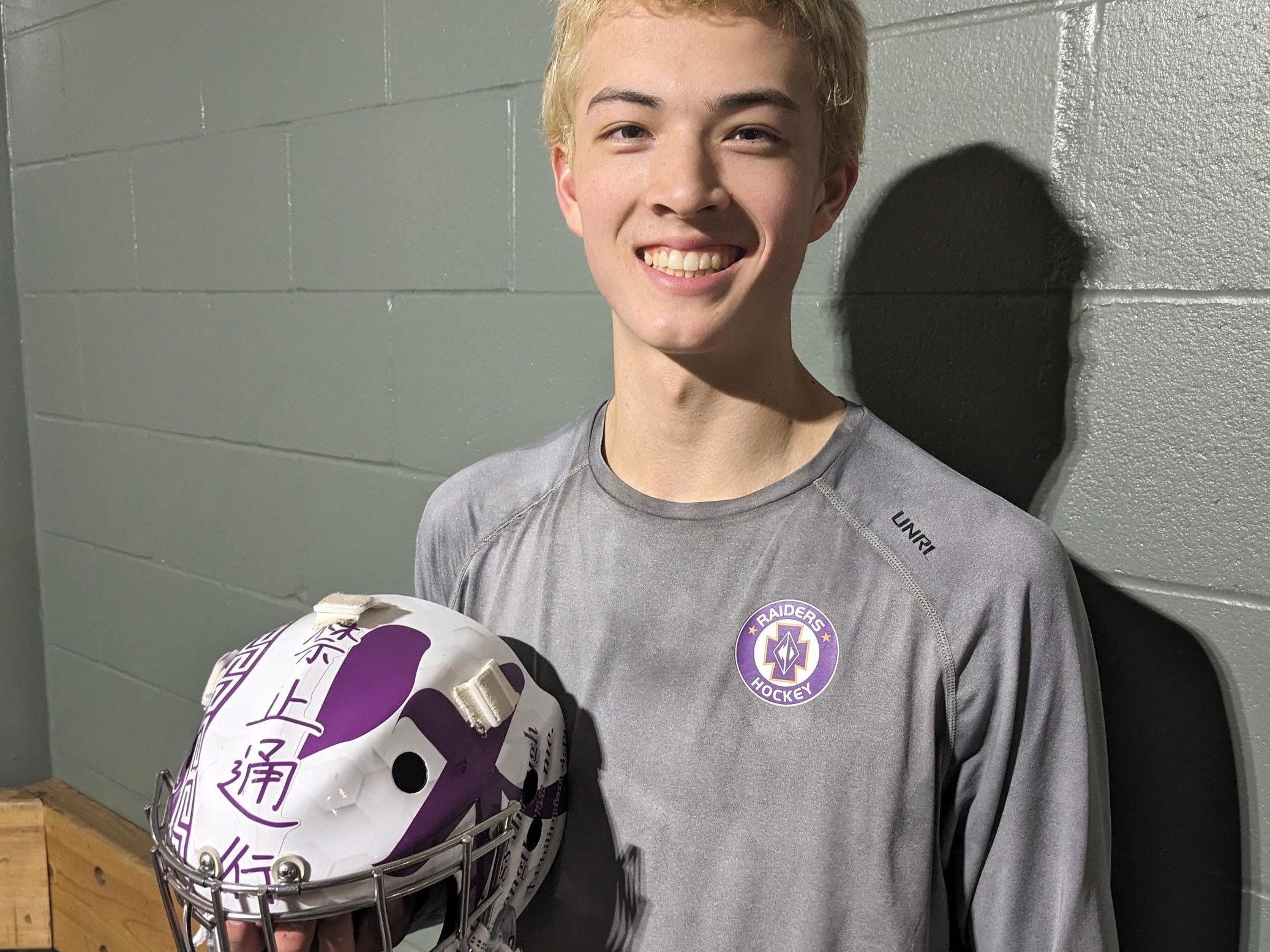 Cretin-Derham Hall goalie Owen Nelson wears his heart on his head