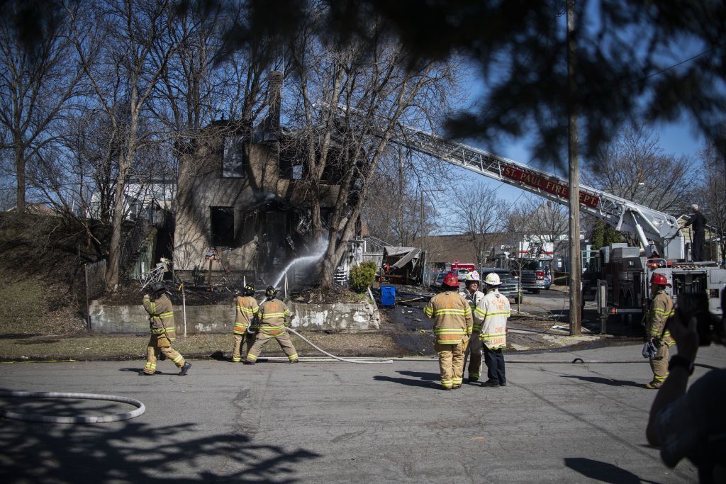Dodging flames and debris, neighbors rush in to rescue 'Sarge' after ...