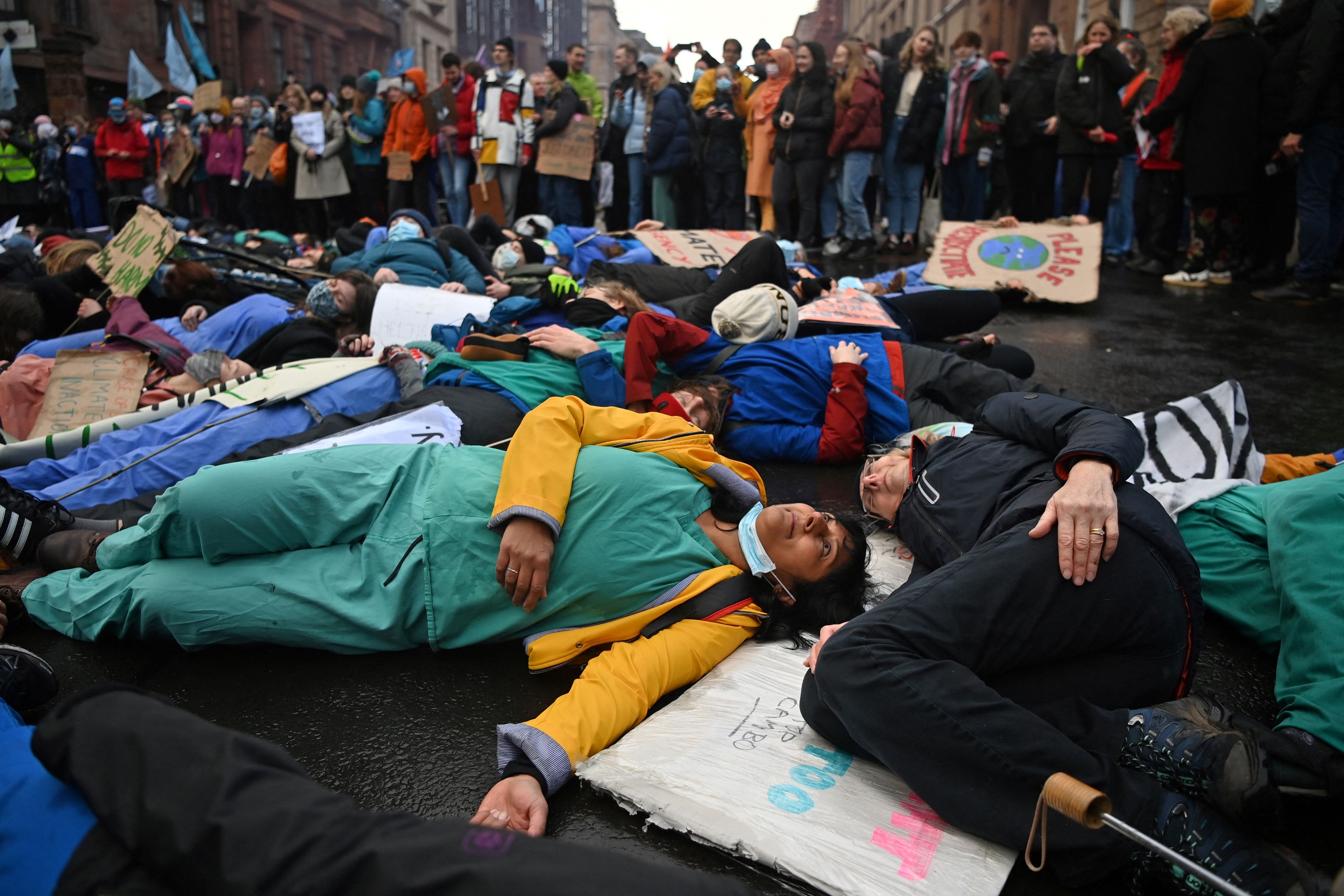 In photos: Thousands of climate activists around the world demand ...