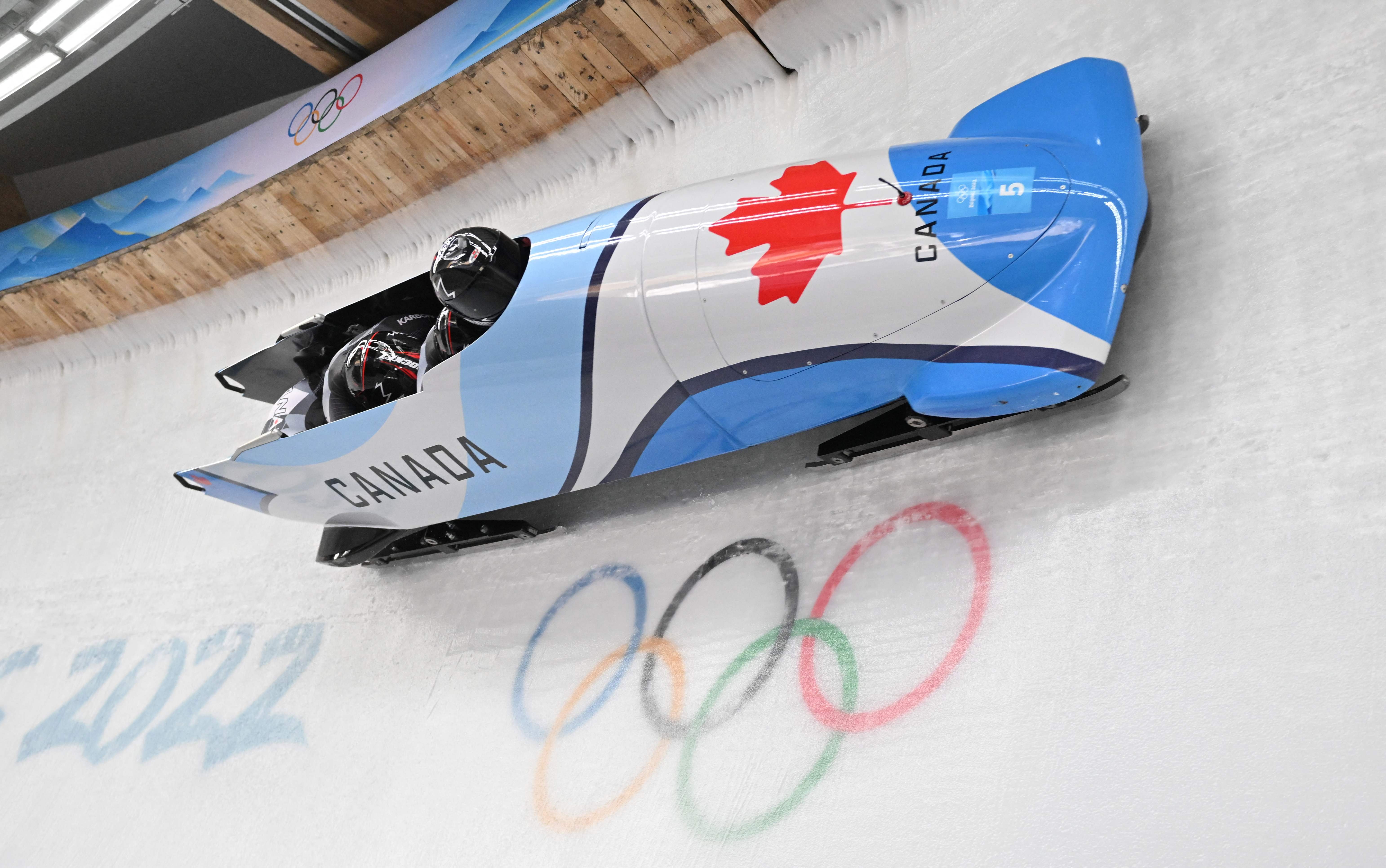 In photos: Canada claims bronze in men's bobsleigh and other Beijing ...