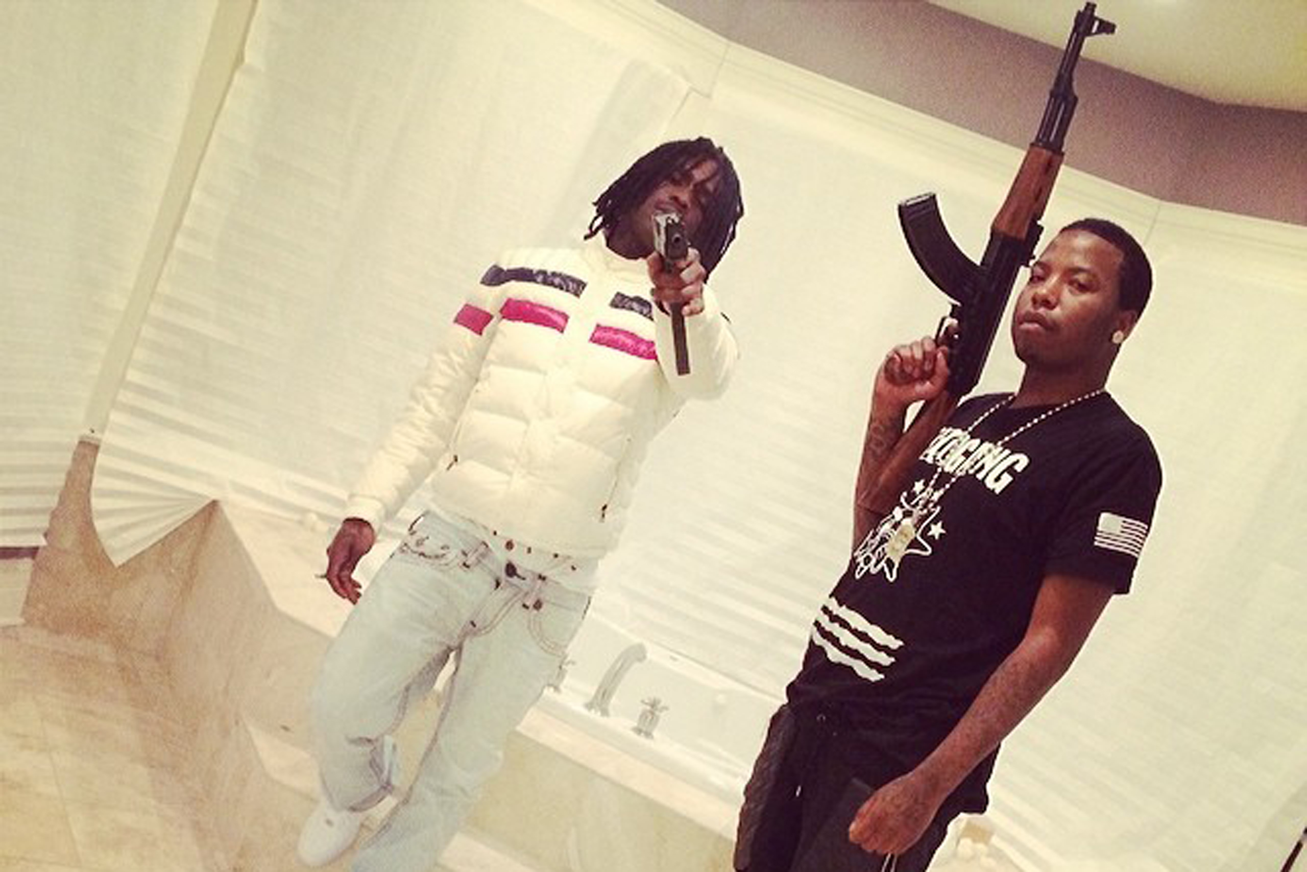 Lil Durk Holding Guns